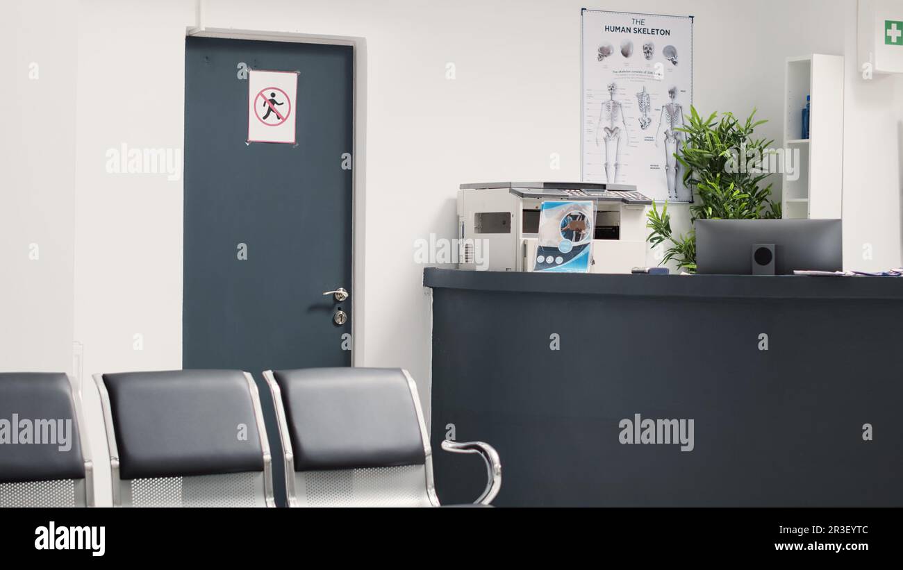 Reception front desk in medical clinic Stock Photo - Alamy