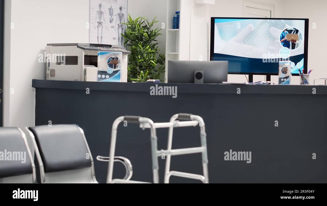 Walk frame in hospital reception counter Stock Photo - Alamy