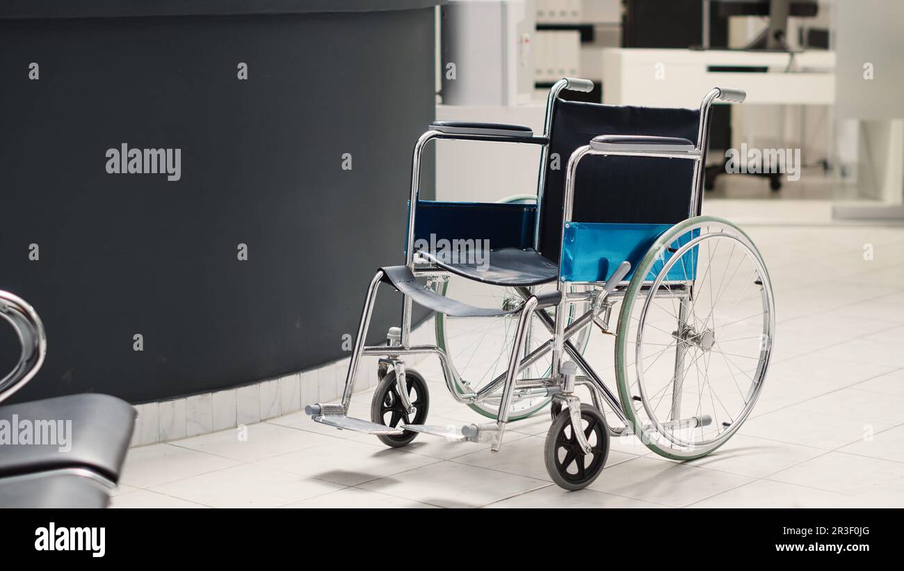 Wheelchair placed in hospital lobby area Stock Photo - Alamy