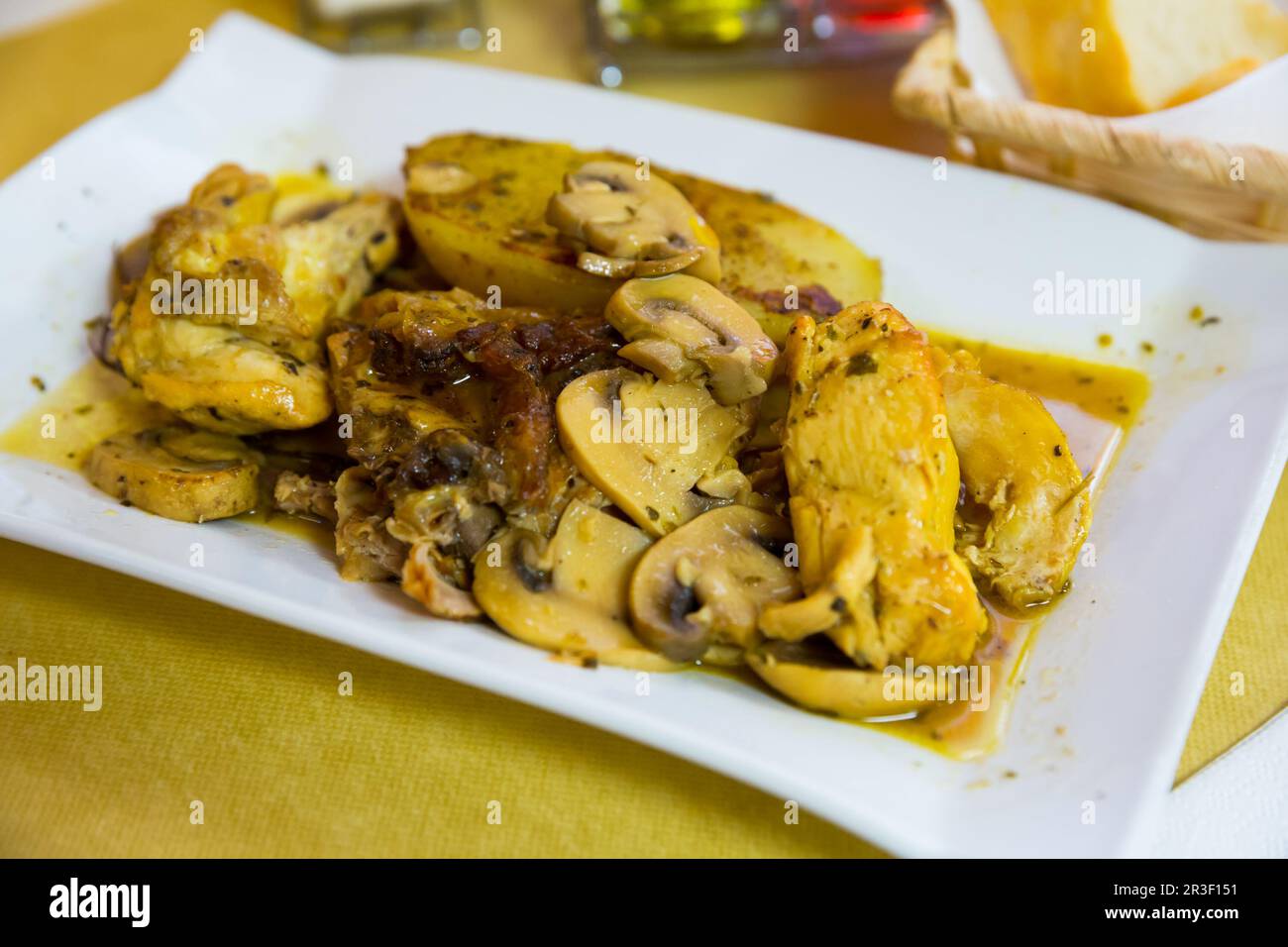 Chicken with Champignon and garlic Stock Photo - Alamy