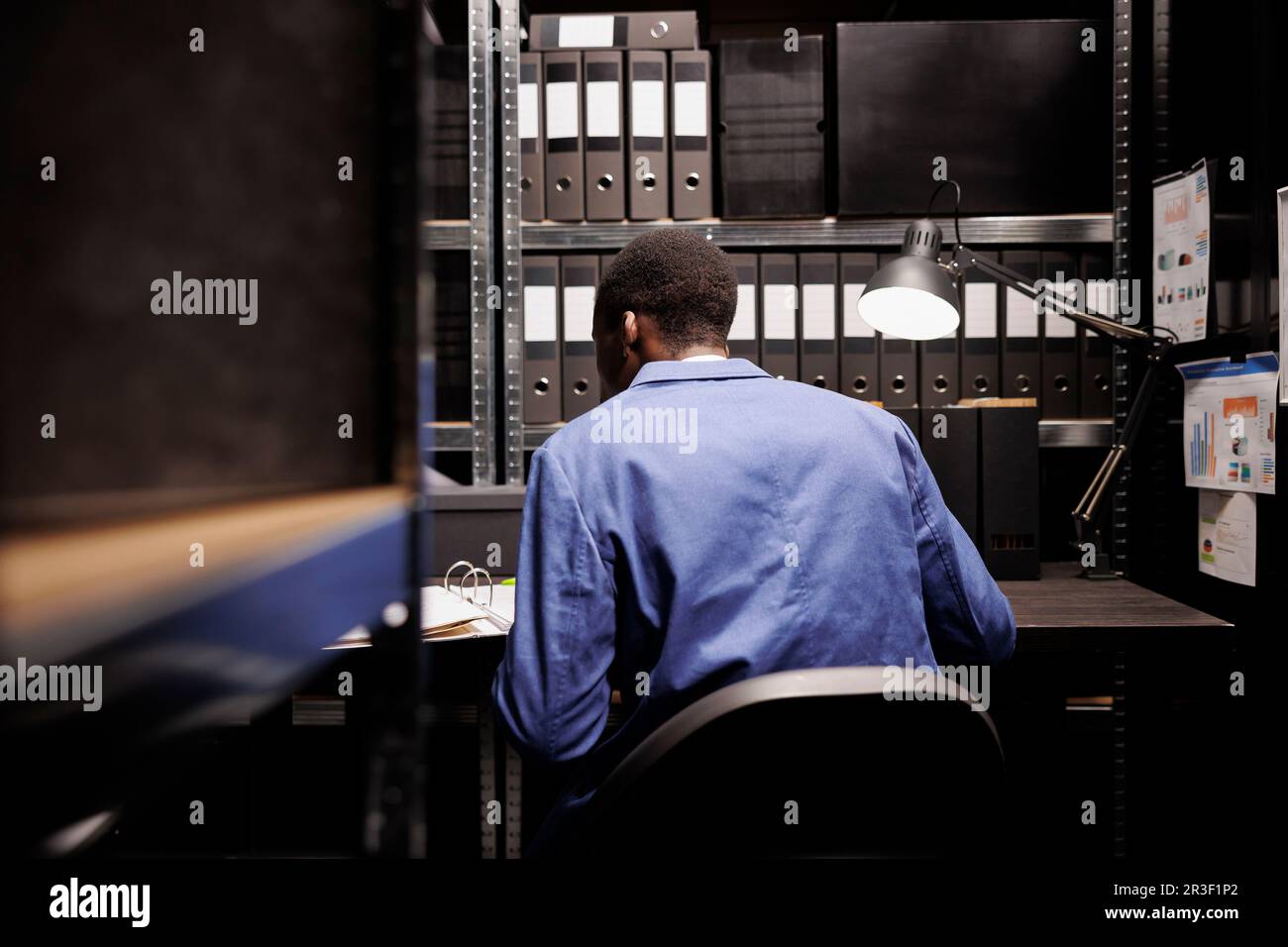 Investigator checking crime scene report Stock Photo - Alamy