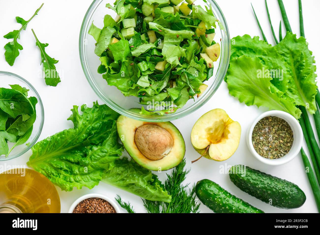 Salad of fresh green vegetables and herbs. Cooking healthy diet or ...