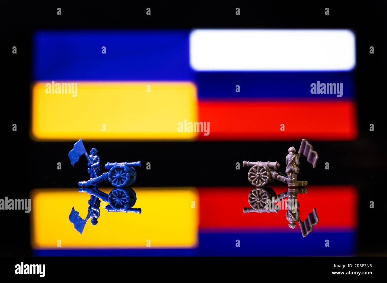 Conceptual image of war between Russia and Ukraine using toy soldiers ...