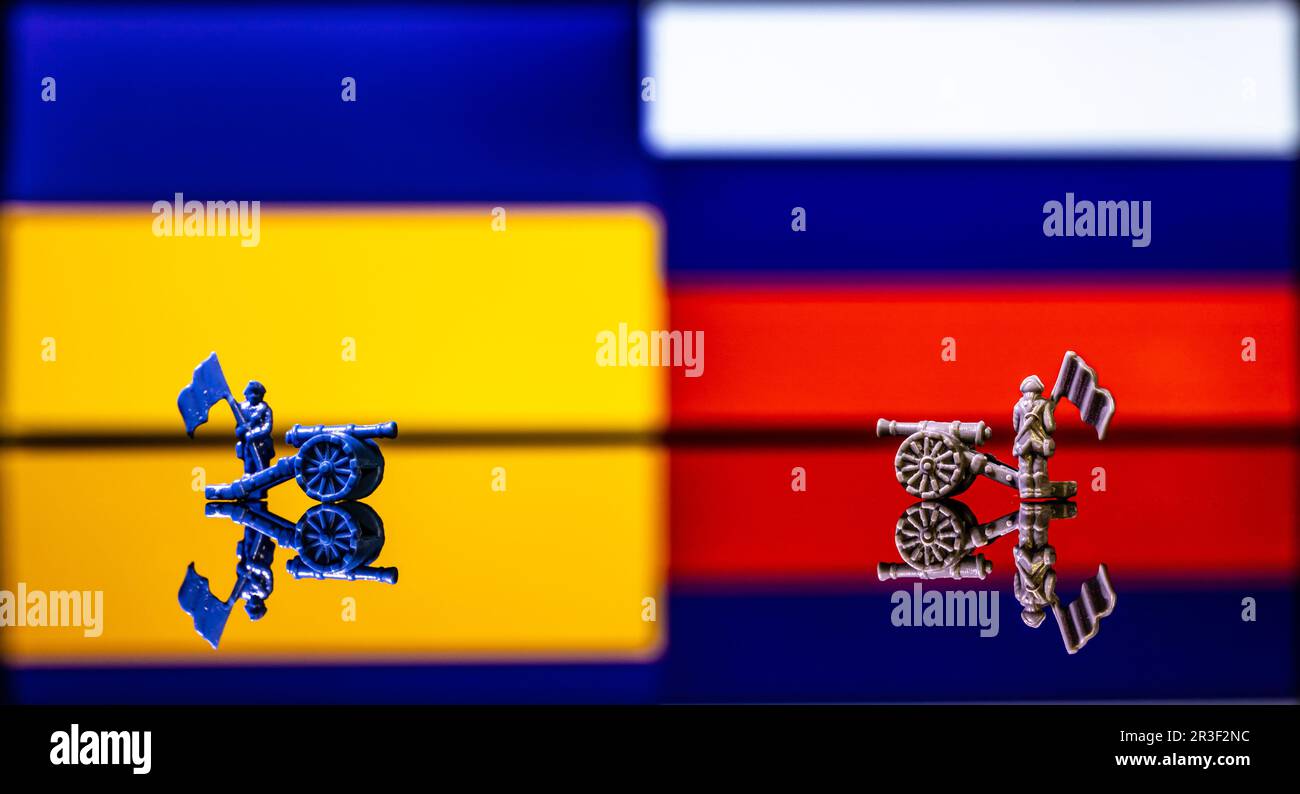 Conceptual image of war between Russia and Ukraine using toy soldiers ...