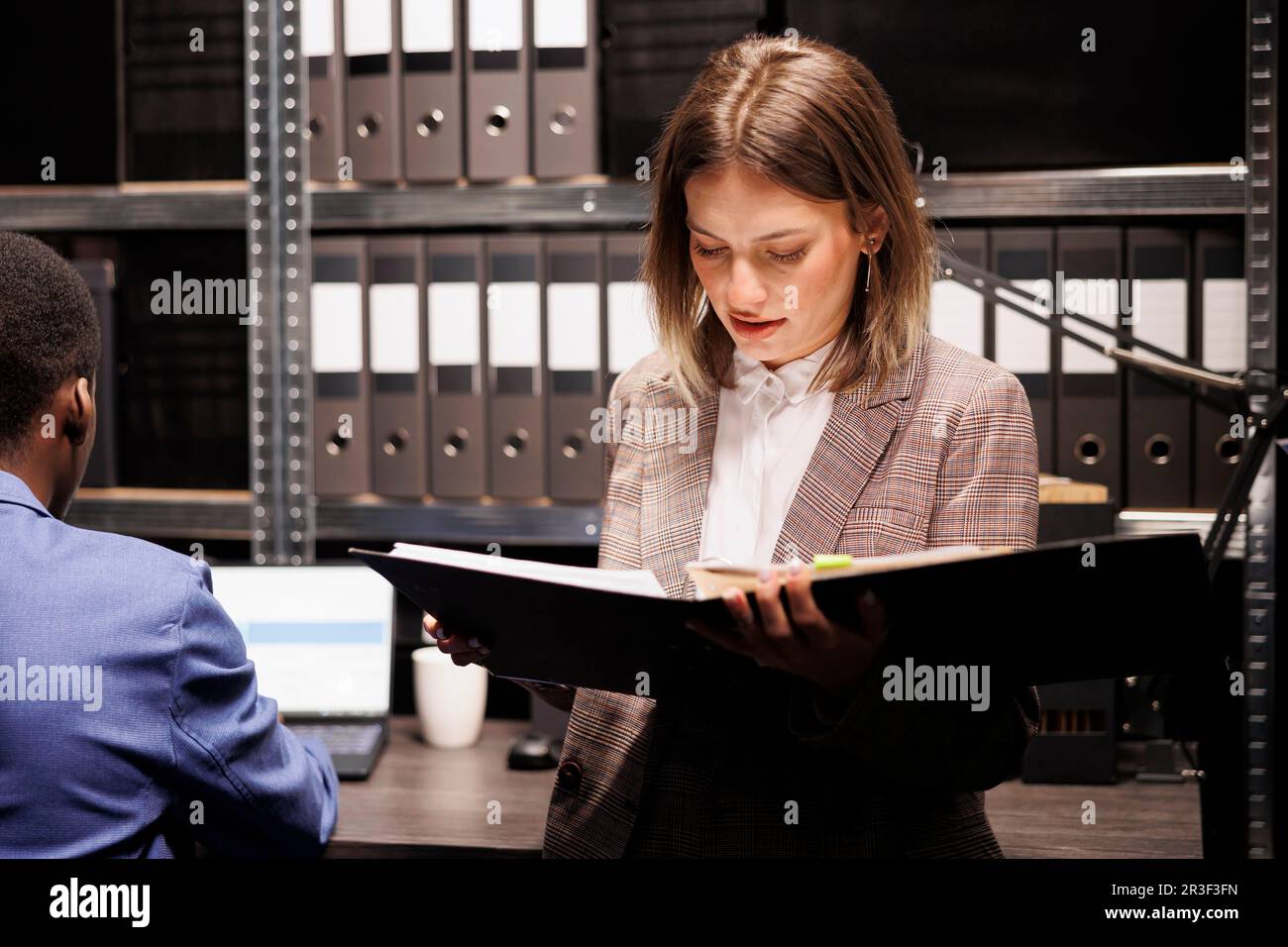 Team discussing crime evidence Stock Photo - Alamy