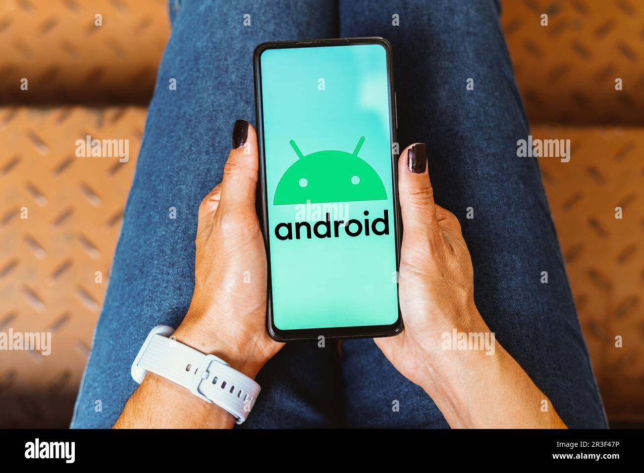 In this photo illustration, the Android logo is displayed on a ...