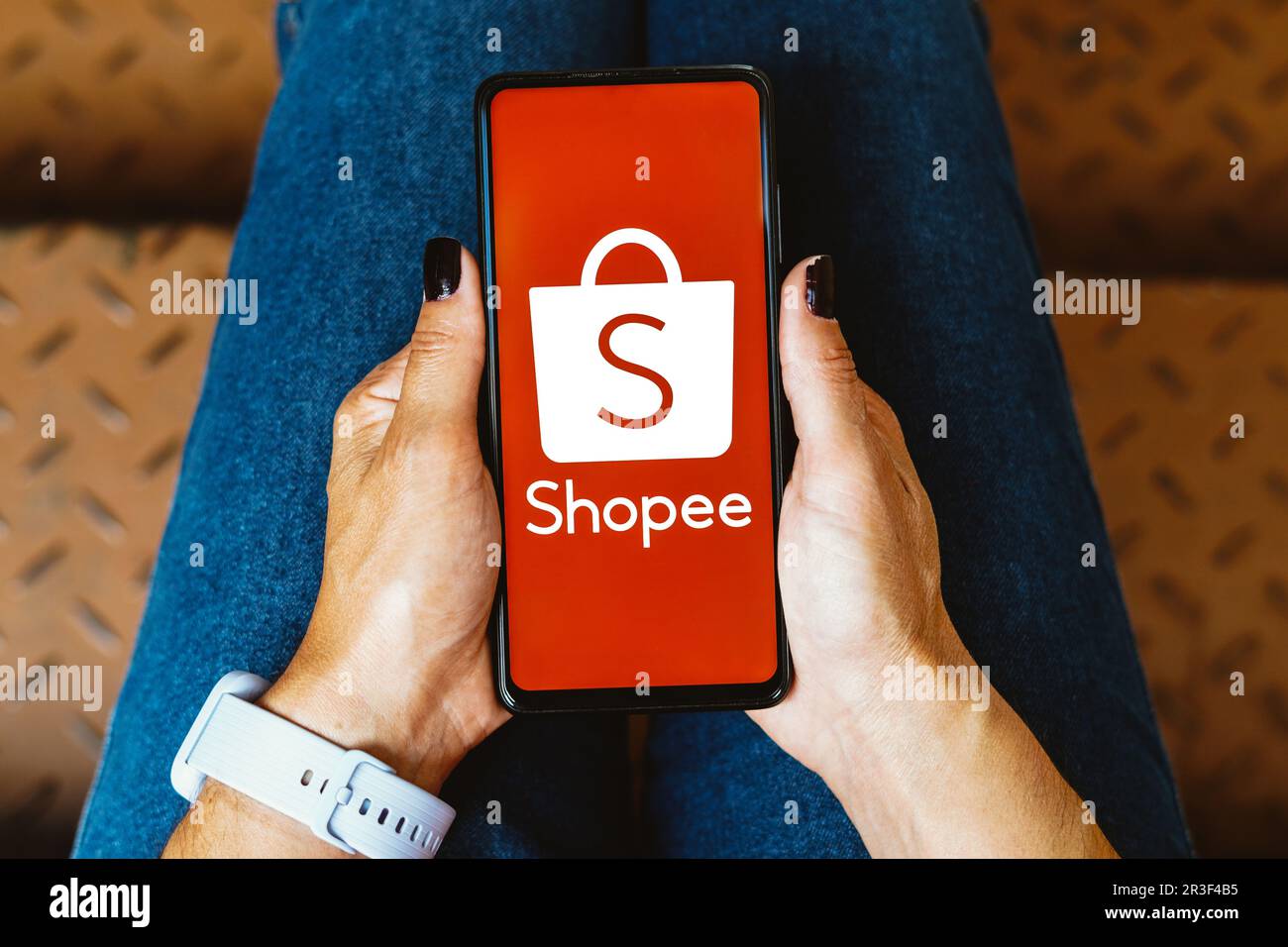In this photo illustration, the Shopee logo is displayed on a ...