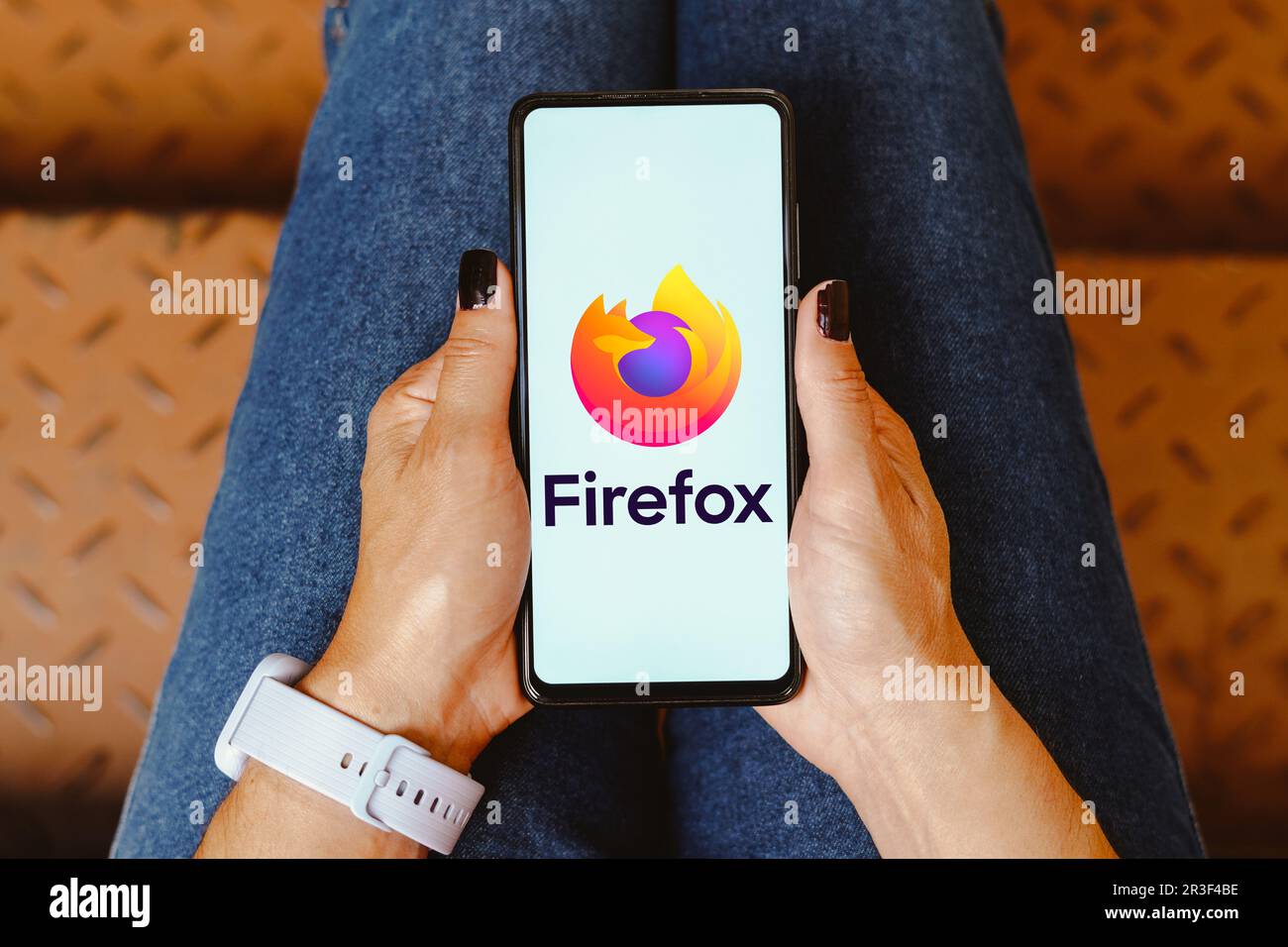 In this photo illustration, the Mozilla Firefox logo is displayed on a smartphone screen Stock ...