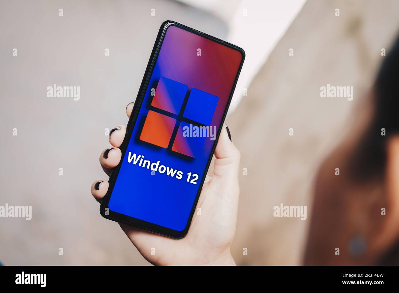 In this photo illustration, the Windows 12 logo is displayed on a ...