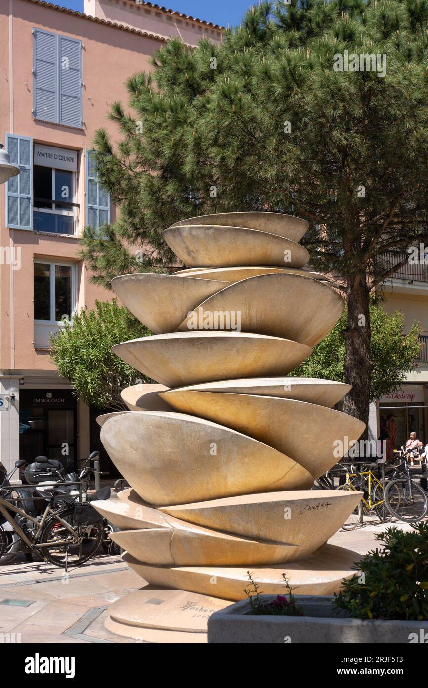 Modern disc sculpture, on a public plaza, in a business district of St ...