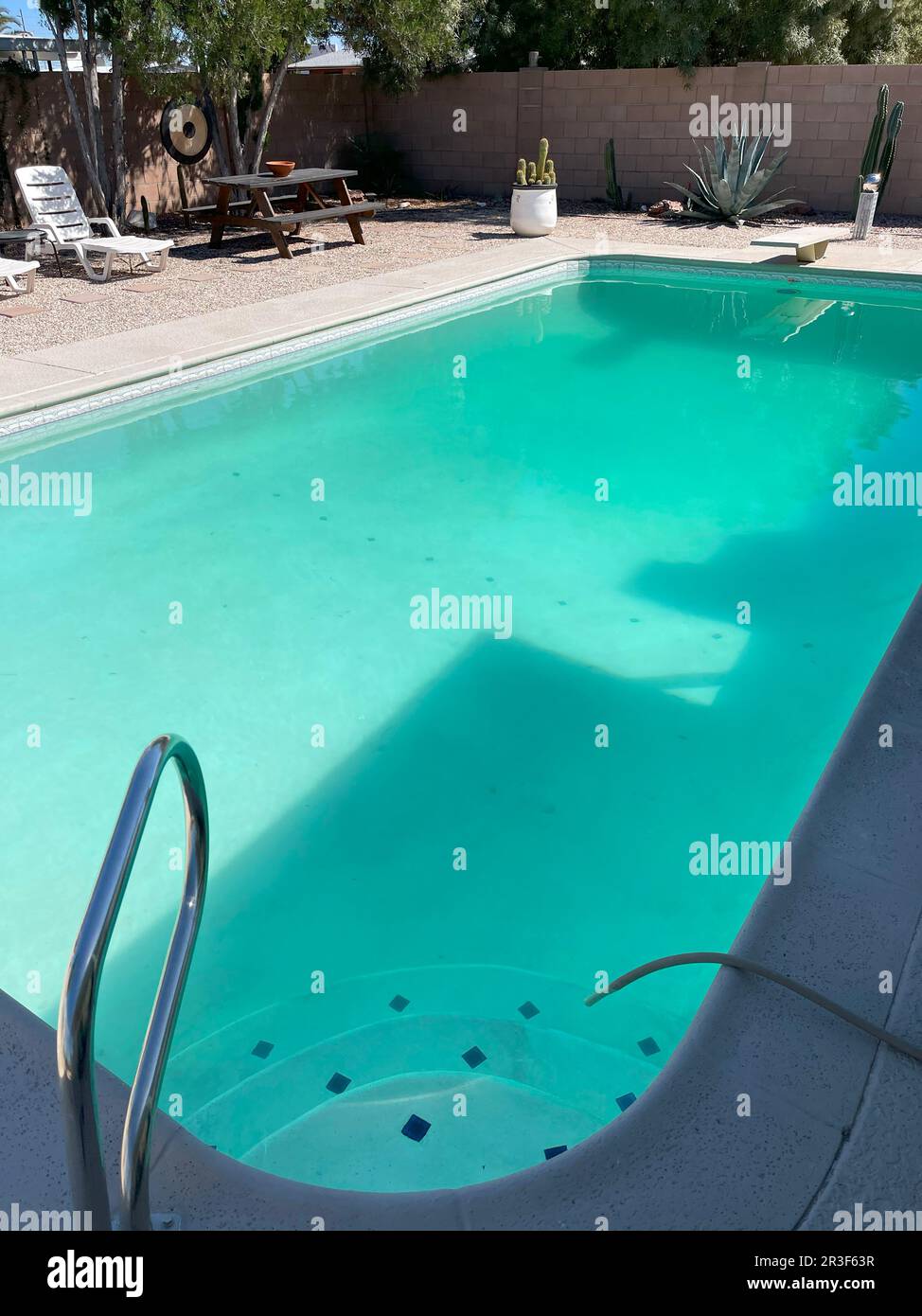 Swimming pool refilled with fresh water but without chemicals Stock ...