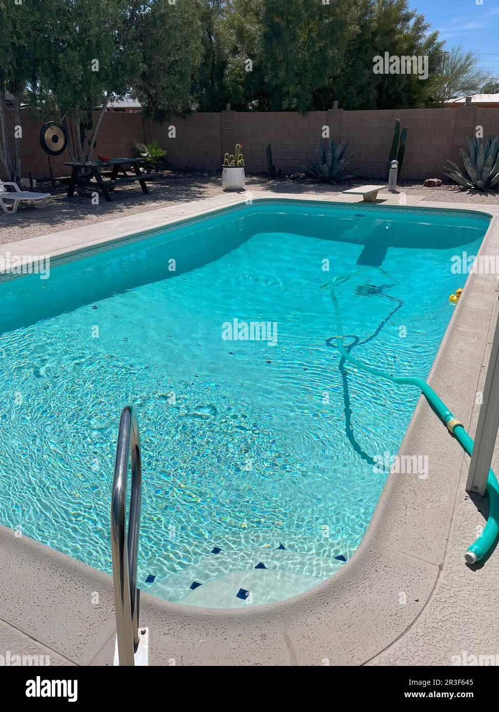 Sparkling water in a swimming pool with fresh water and added chemicals ...