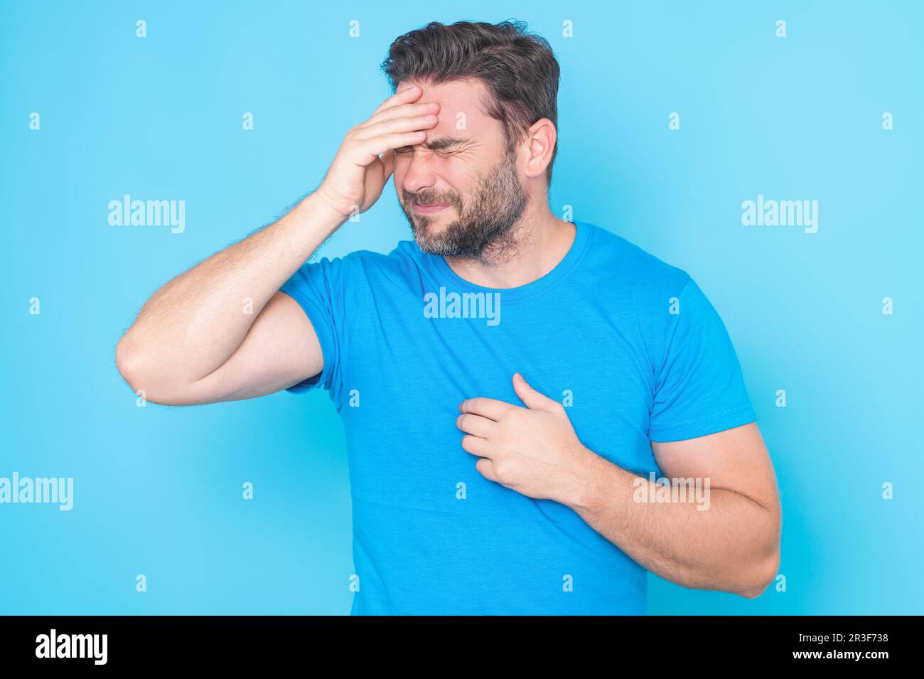 Head pain. Cephalalgia and migraine. Man with sinus headache, tension ...