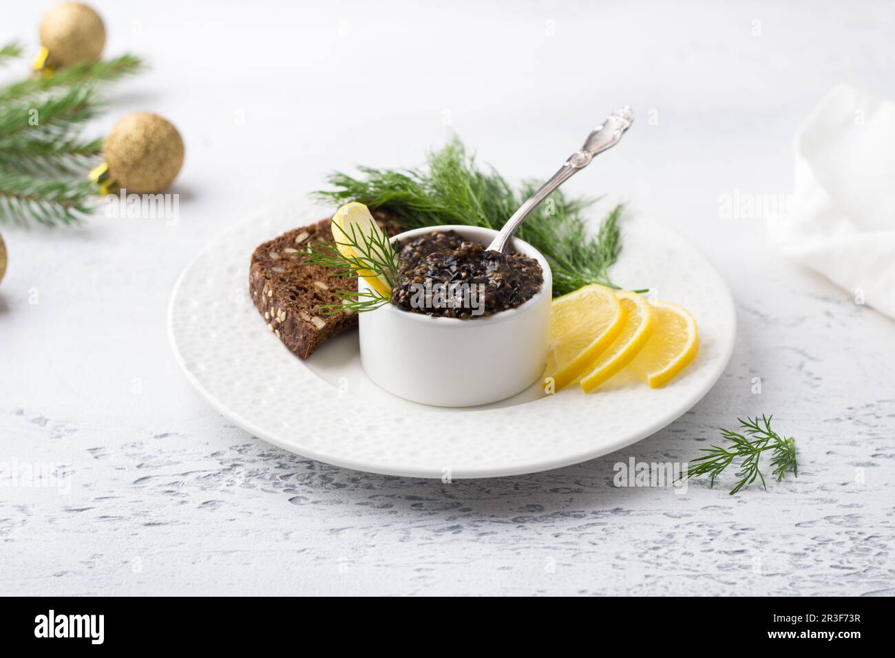 Vegan healthy chia caviar with nori and soy sauce in a white bowl with ...
