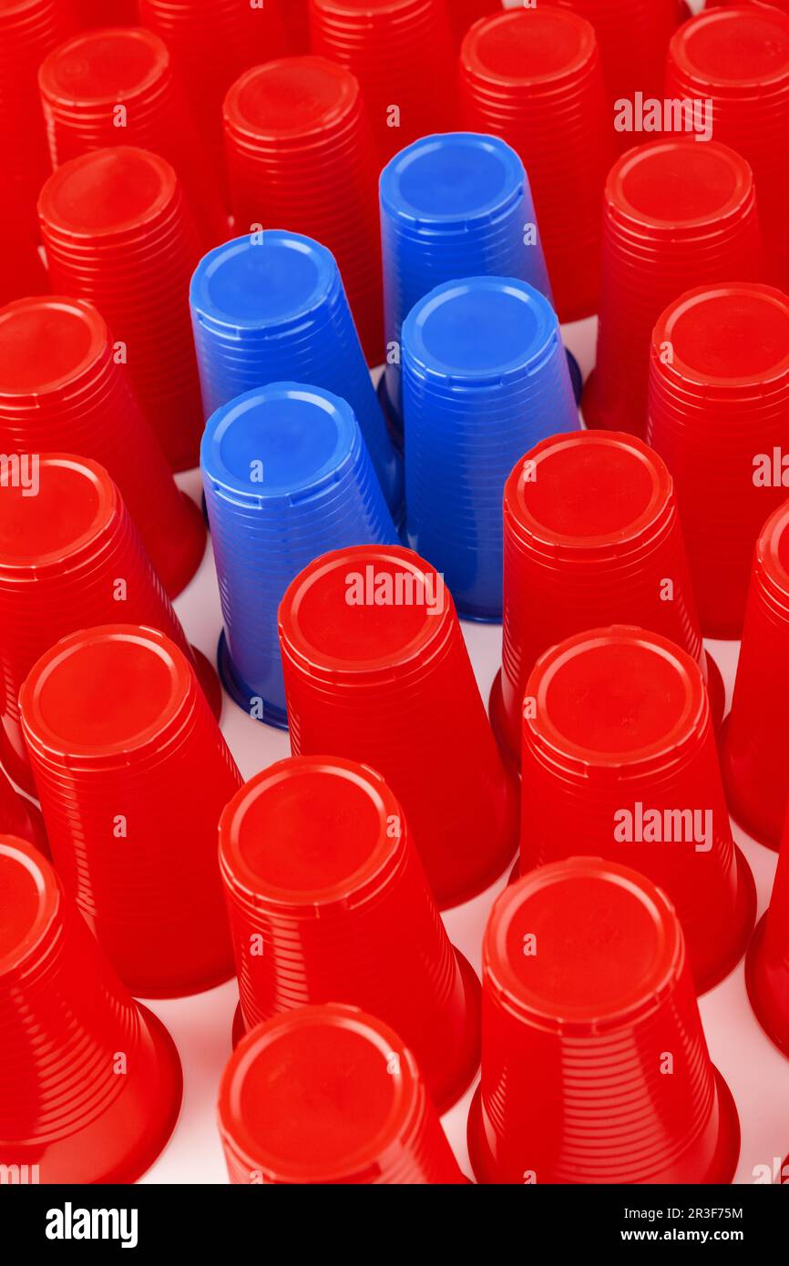 Large group of disposable plastic cups, red and blue Stock Photo - Alamy