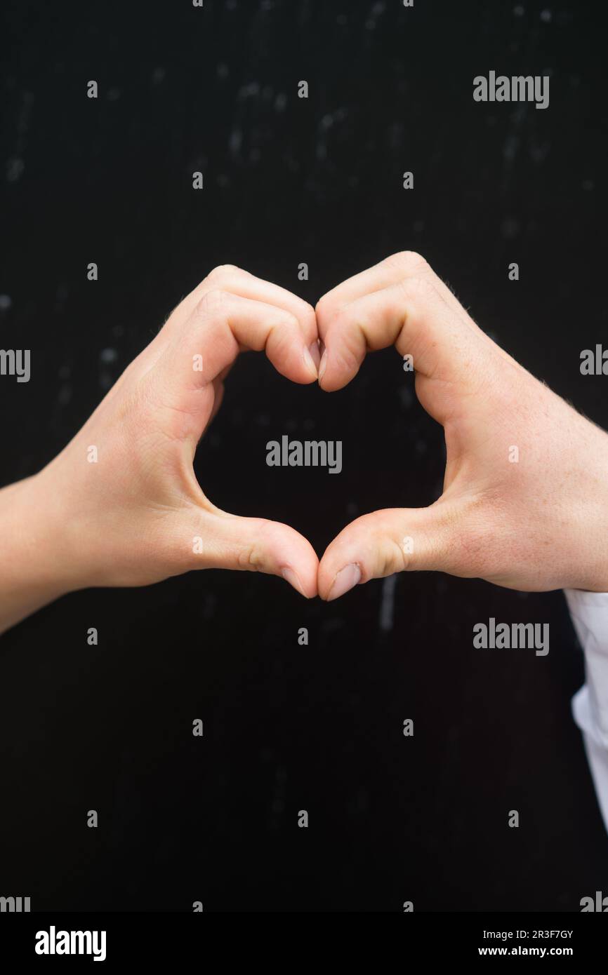 Heart formed with hands Stock Photo - Alamy