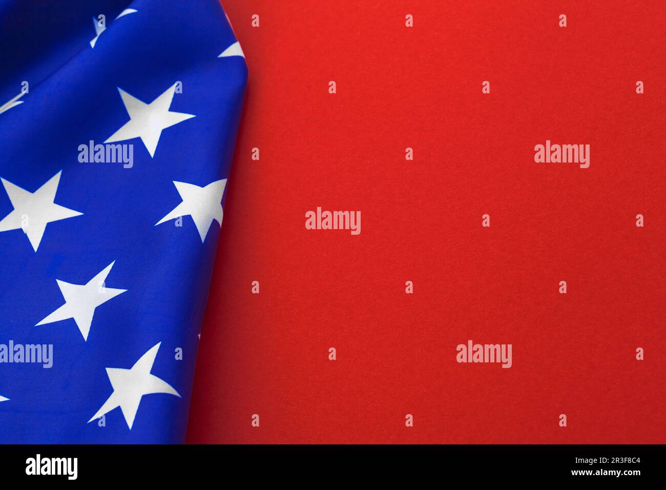 American flag on red background Stock Photo - Alamy