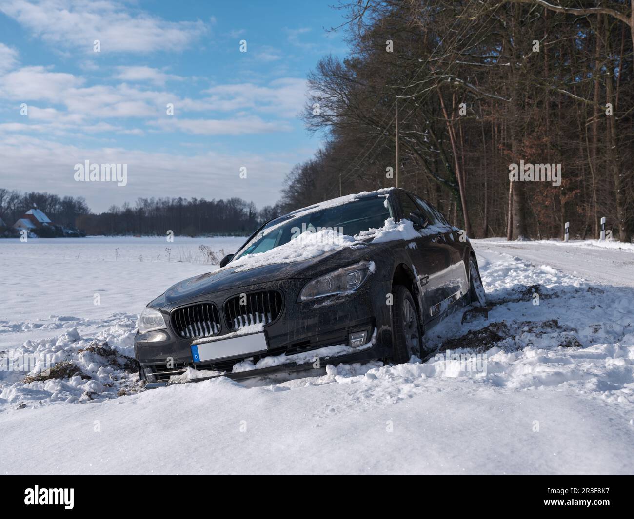 Car in roadside ditch Stock Photo - Alamy