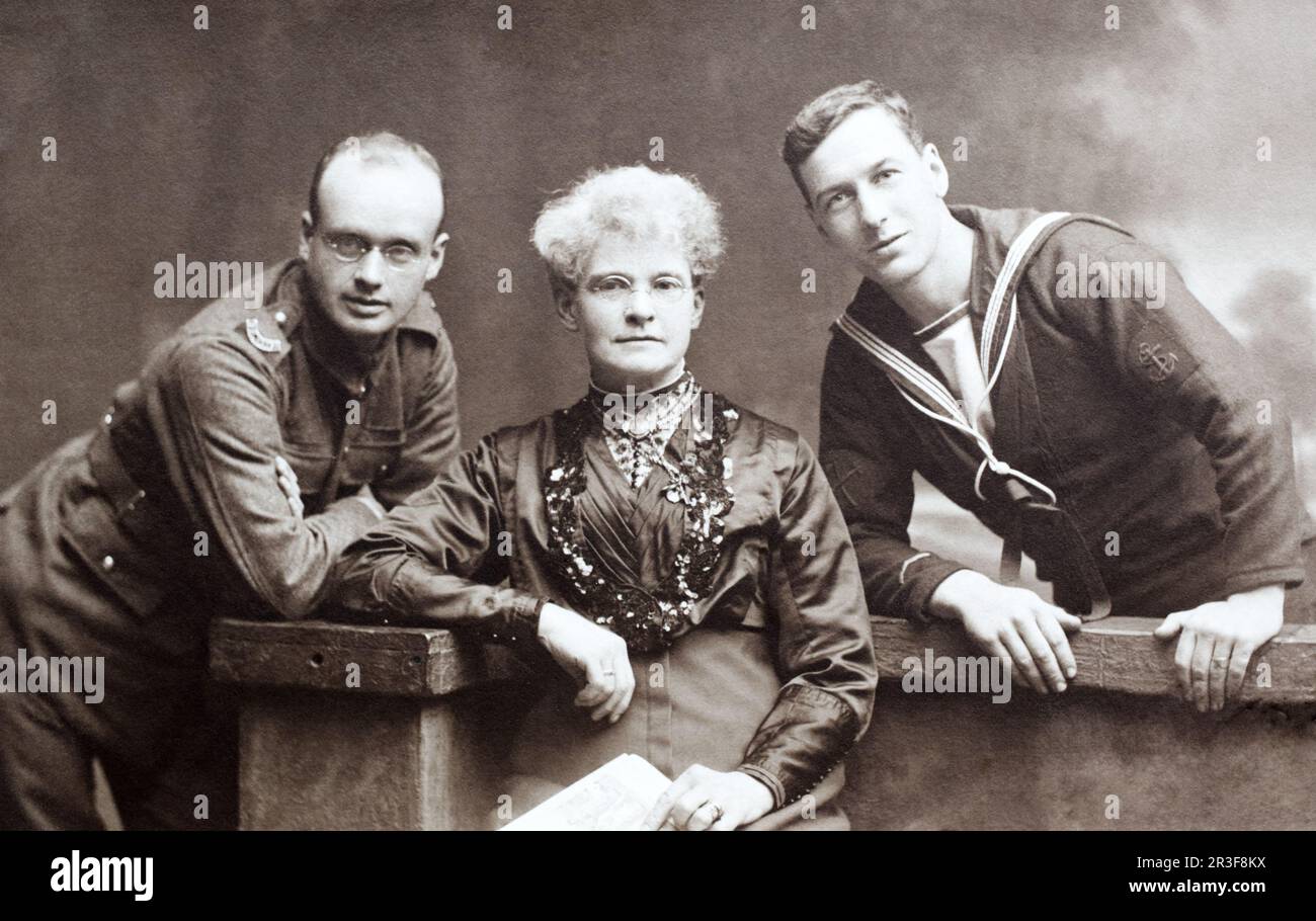 A British arm y soldier and Royal Navy sailor with their mother ...