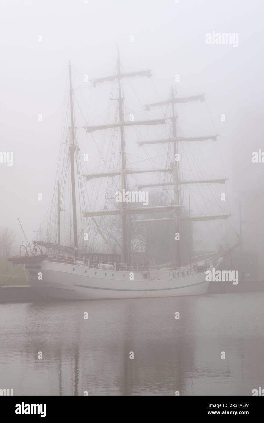 Three-master sailing ship at fog Stock Photo - Alamy