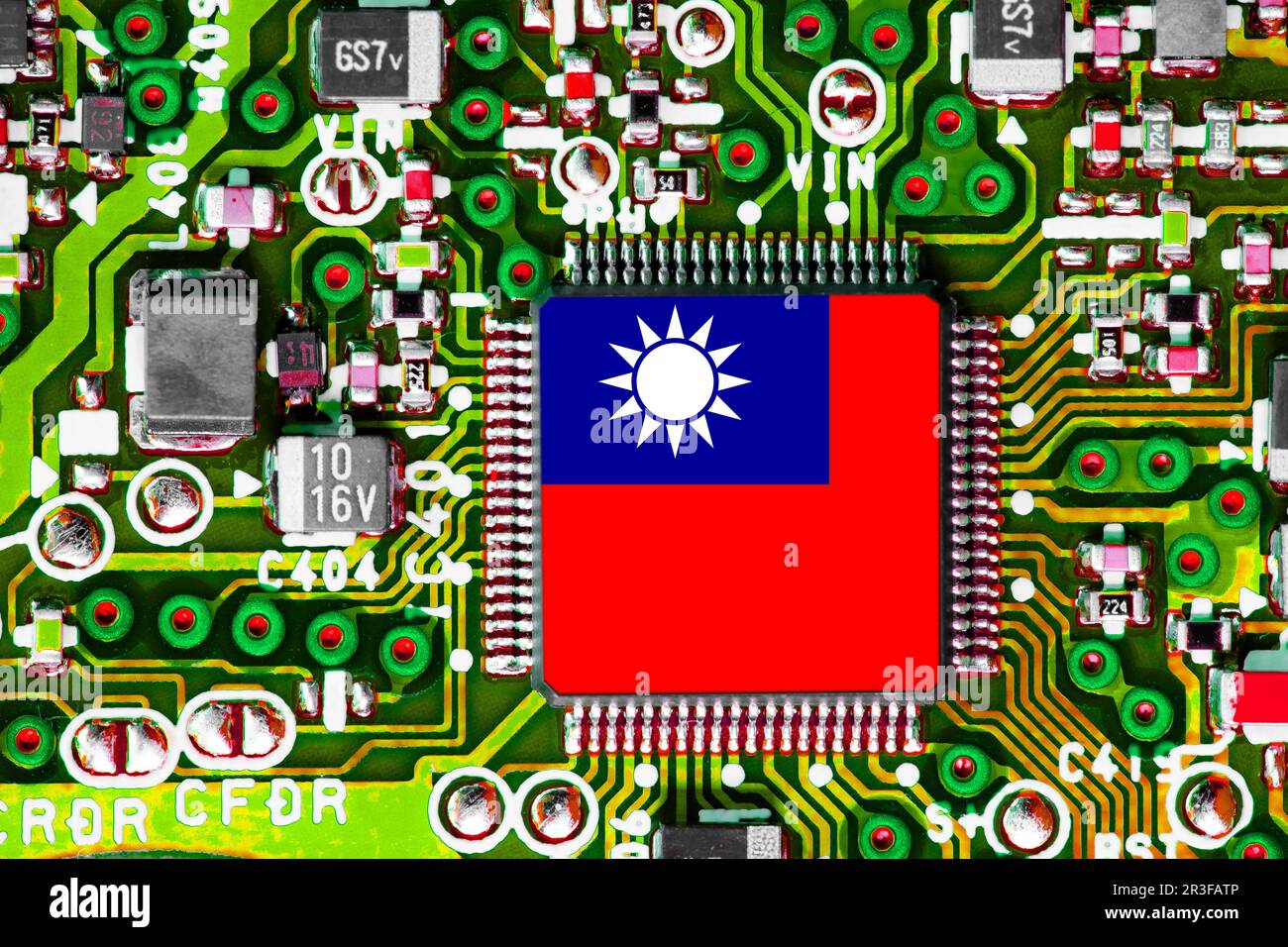 Taiwanese National Flag overlaid on PC micro chip on integrated circuit ...