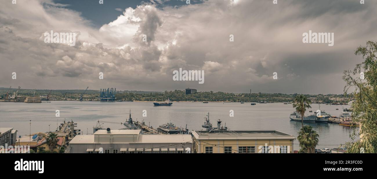 Stormy clouds over the military and commercial port of Augusta ...
