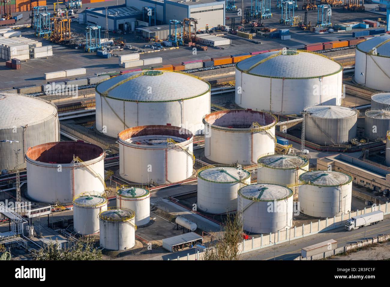 White storage tanks seen in the commercial port of Barcelona Stock ...