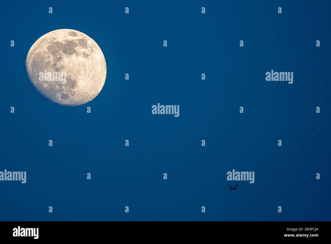 Moon and plane Stock Photo - Alamy