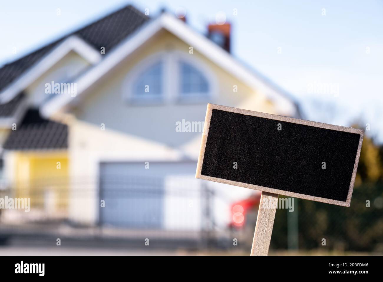 Blank Black billboard against new house building Empty mockup template ...