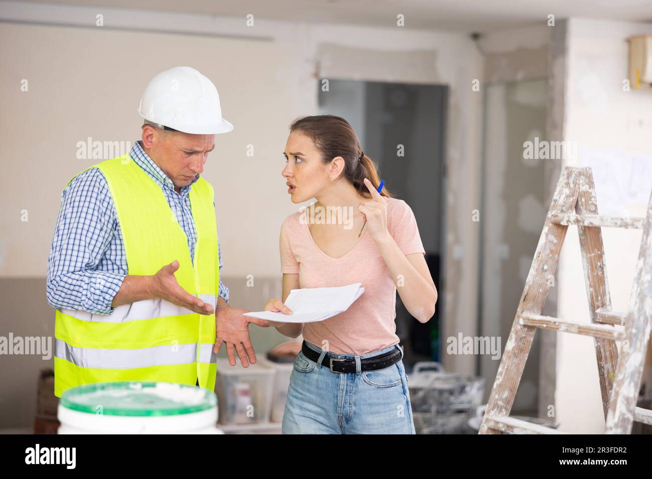 Woman signing construction contract contractor hi-res stock photography ...