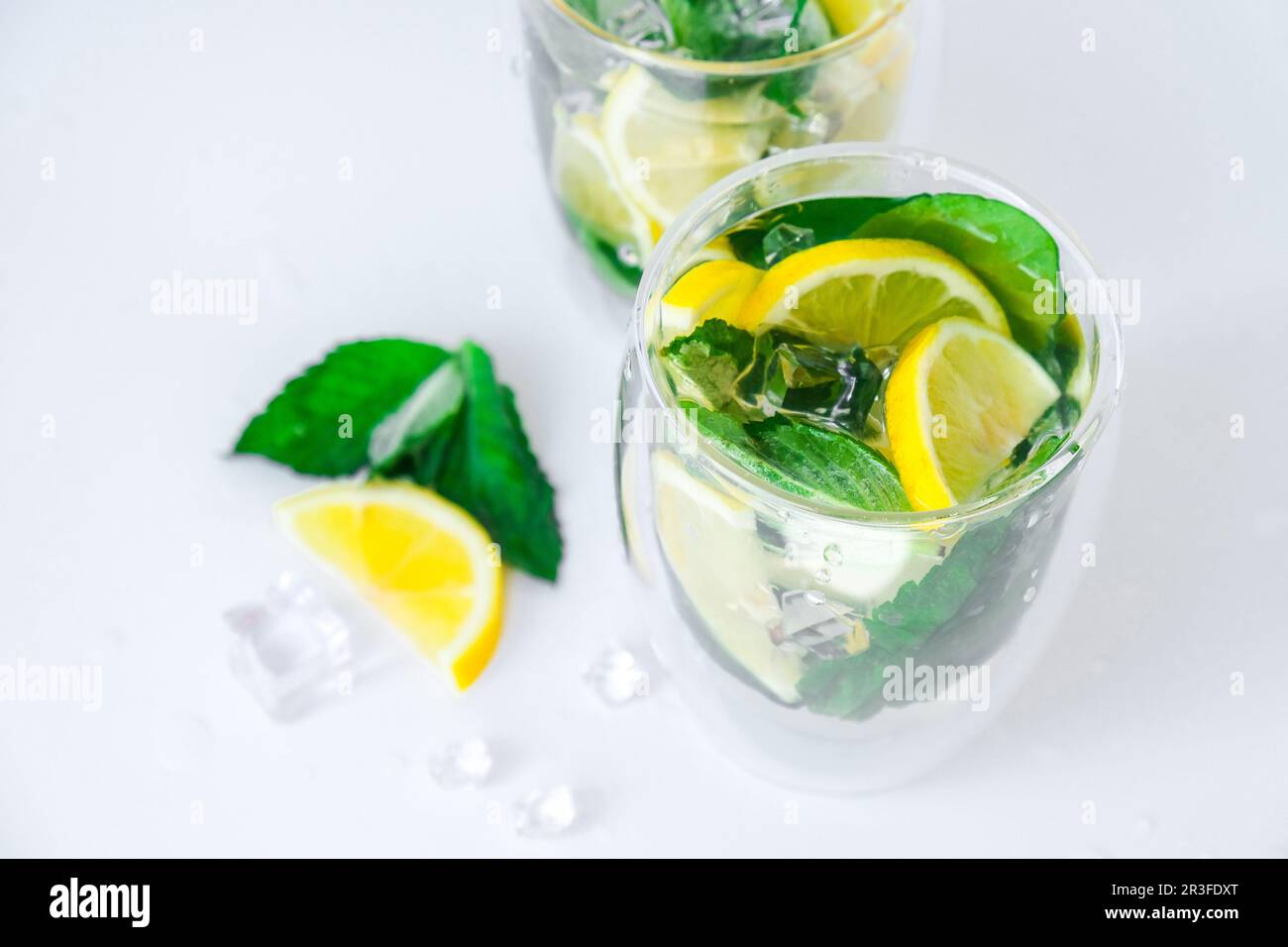 Mojito refreshing cocktail, alcohol drink. Lemonade with lemon and mint ...