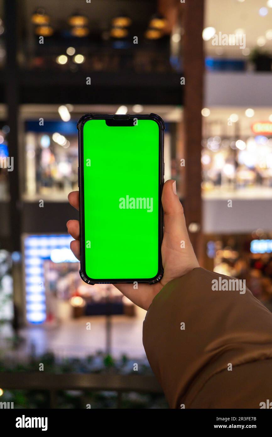 Woman smart phone chroma hi-res stock photography and images - Alamy