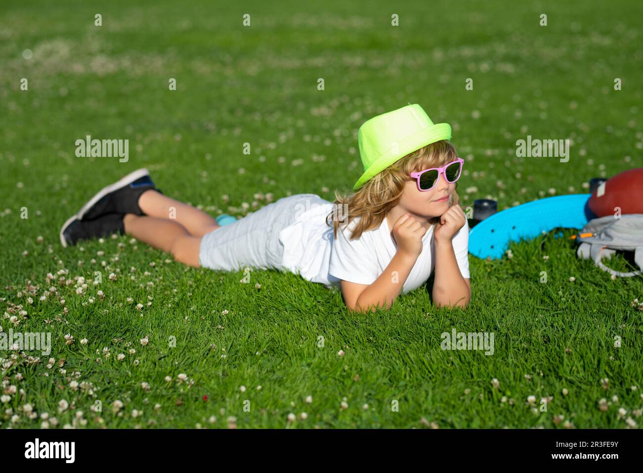 Kids playing outdoors in spring park. Freedom and carefree. Relaxing ...