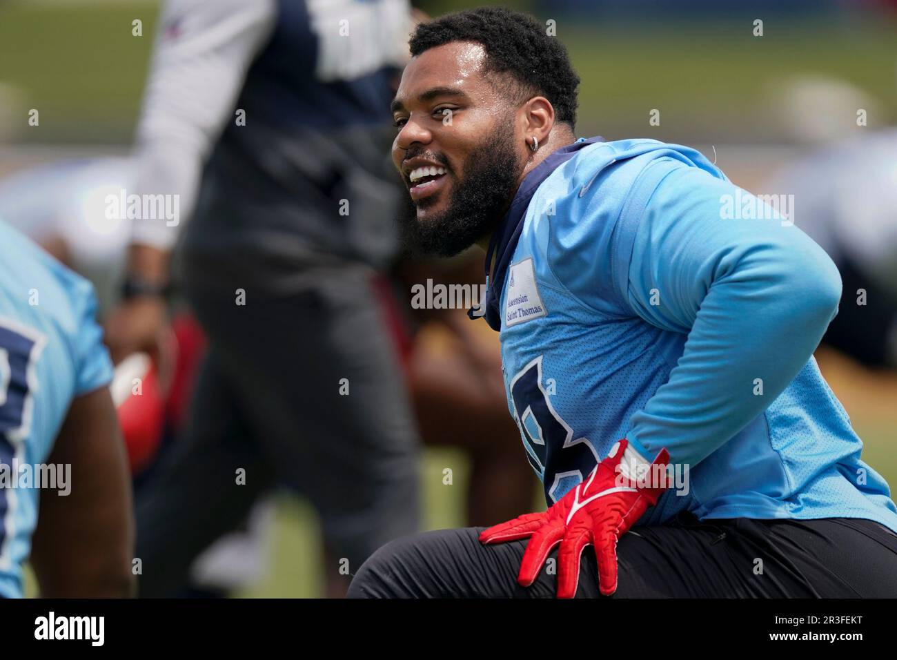 Tennessee Titans defensive tackle Jeffrey Simmons shares a laugh with ...