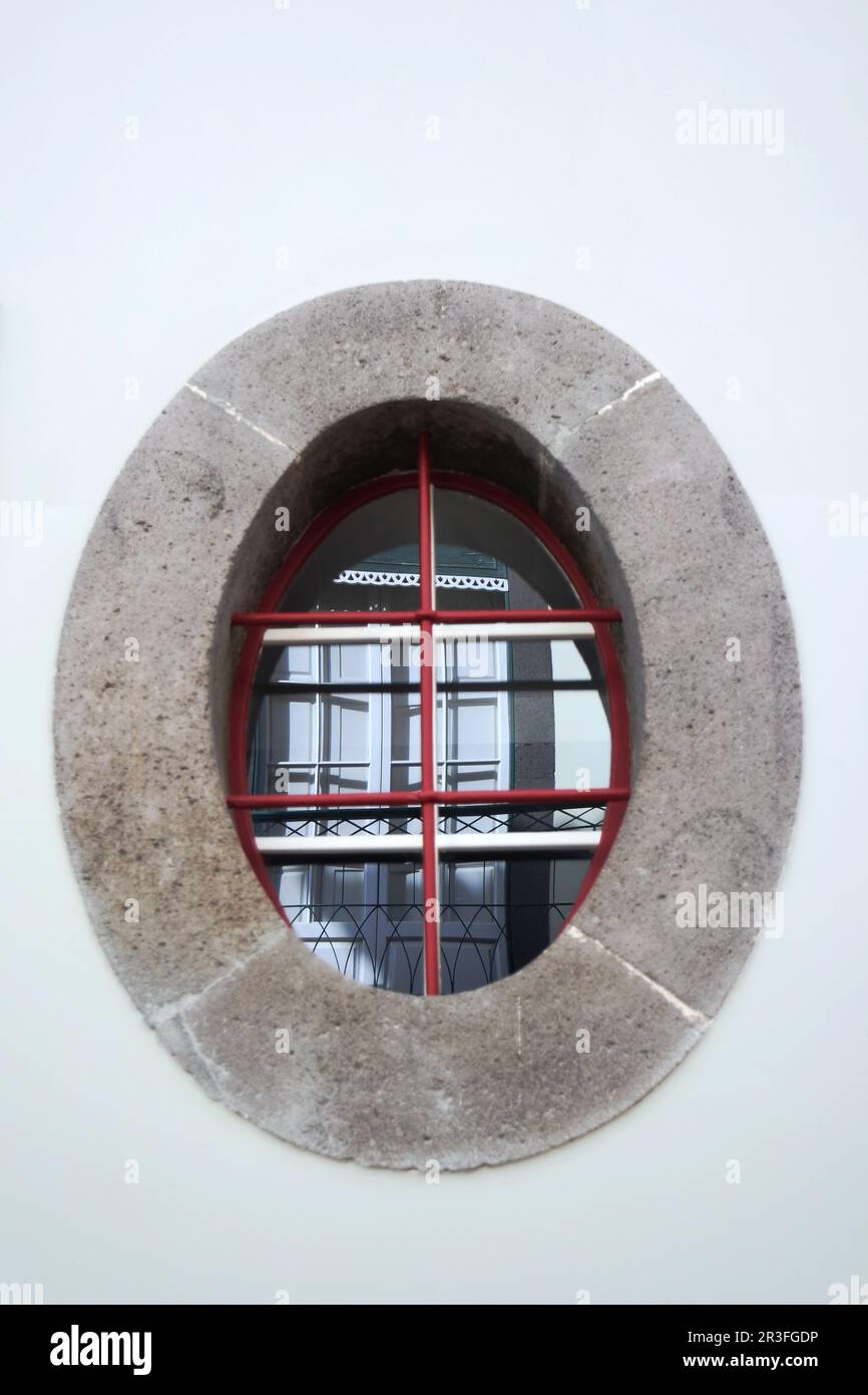 Oval window with reflection Stock Photo - Alamy