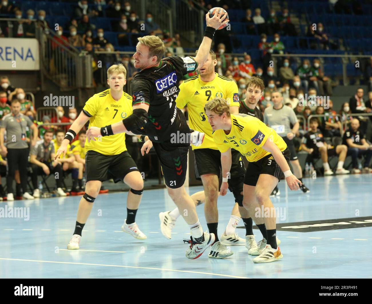 Magnus Gullerud (SCM) with Emil Berlin (IK SÃ¤vehof) Handball EHF ...