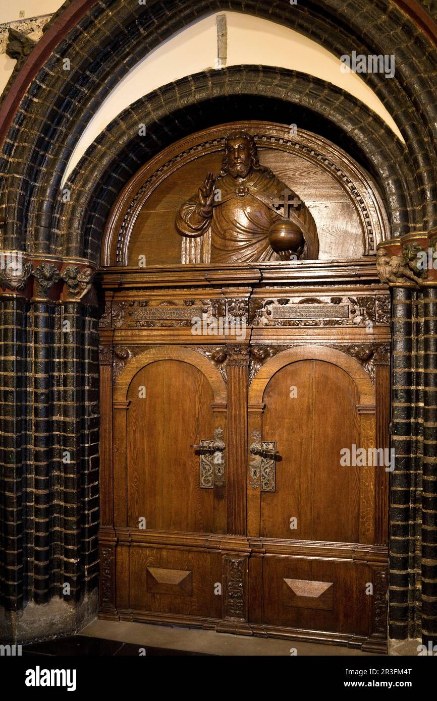 Imposing wooden door in the entrance hall, historic Luebeck Town Hall ...