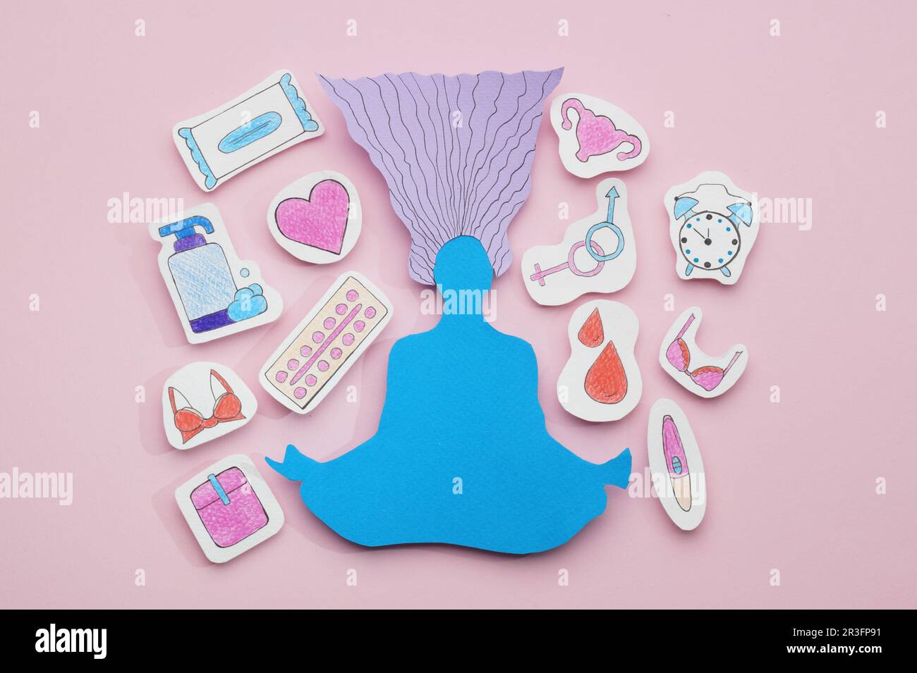 Woman paper figure with personal hygiene products and gender sign on ...