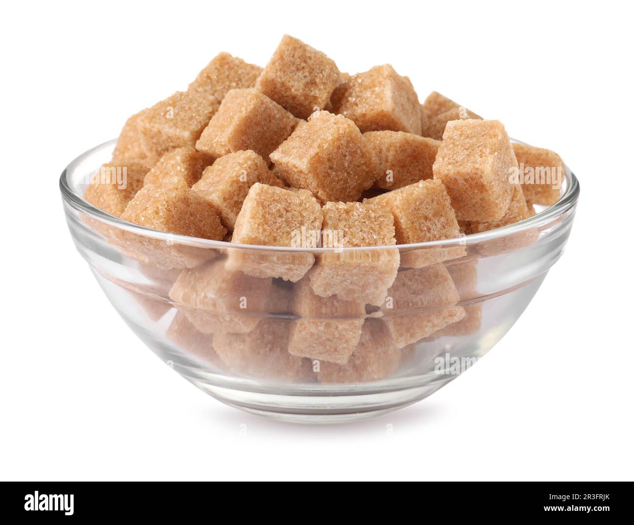Glass bowl of brown sugar cubes isolated on white Stock Photo - Alamy