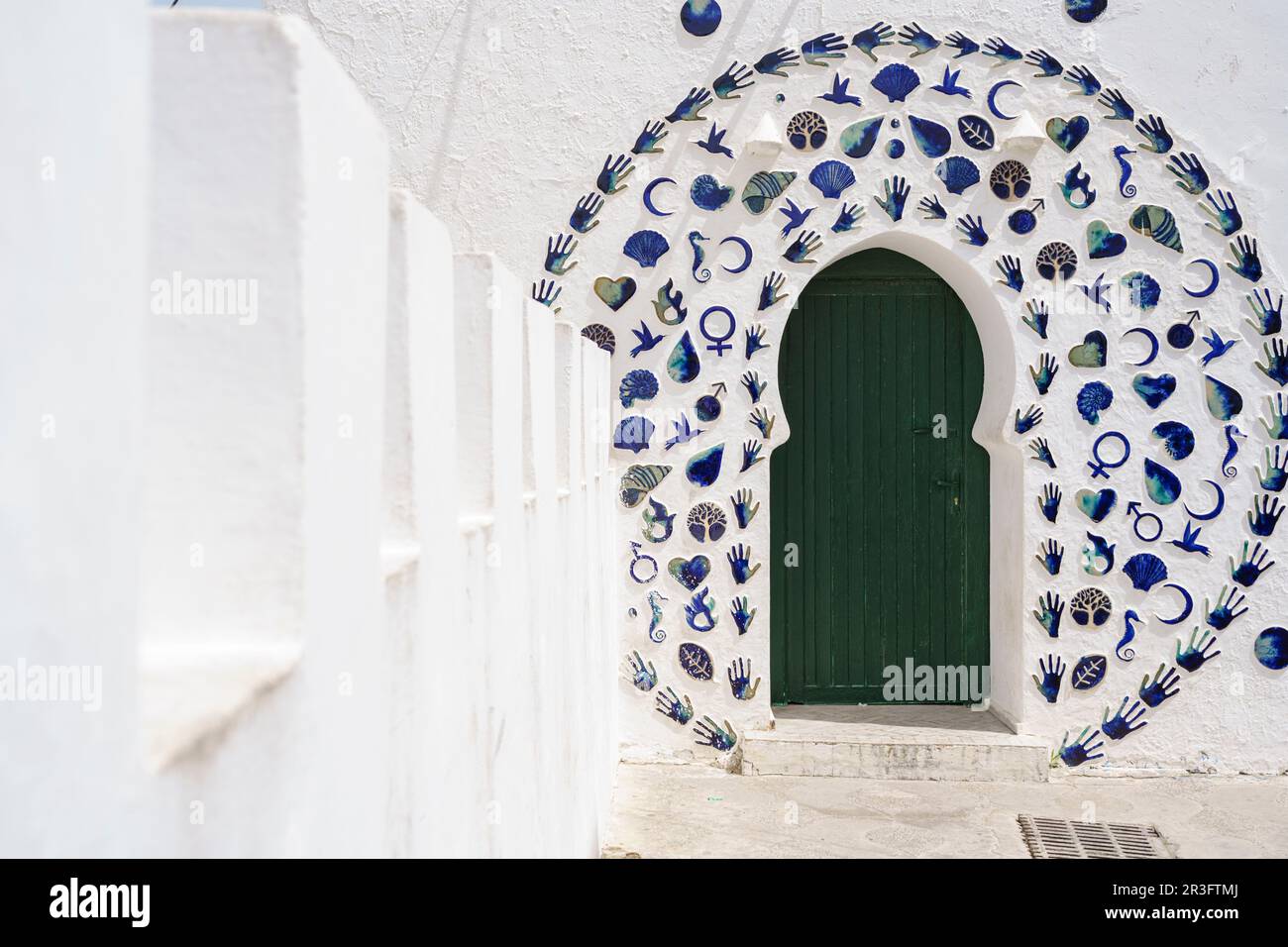 decorated door and tourists, Asilah, morocco, africa Stock Photo - Alamy
