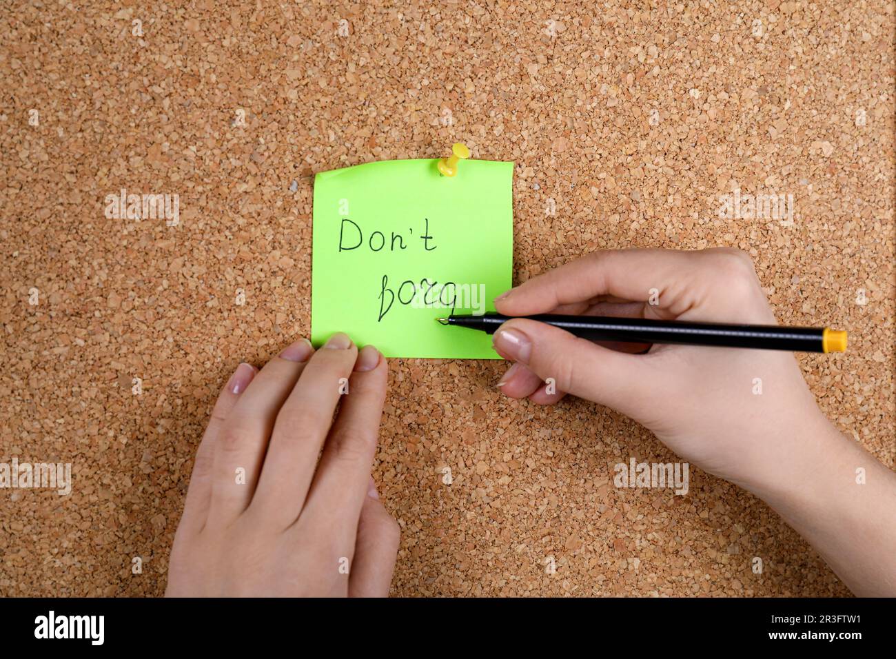 Woman writing post it note hi-res stock photography and images - Alamy