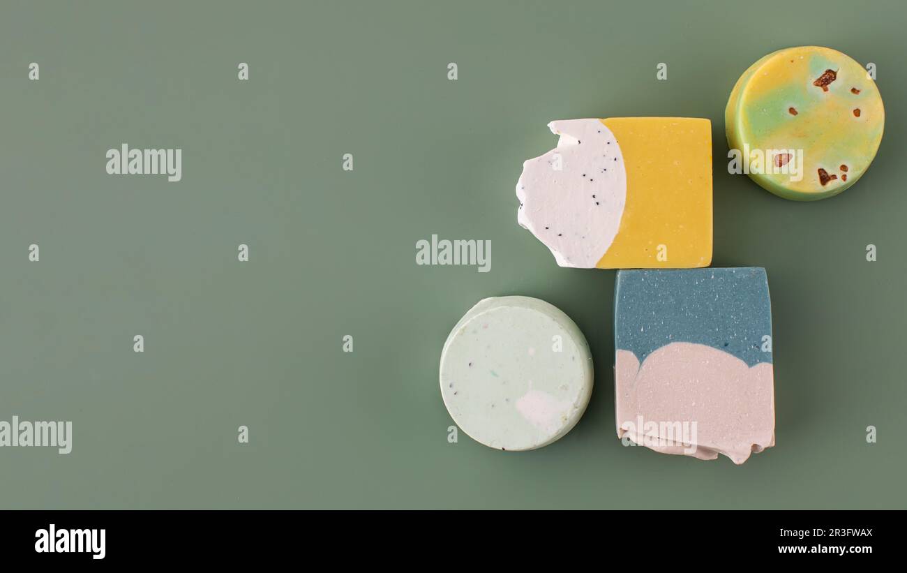 Pieces of different shapes and colors of handmade soap. Natural ...