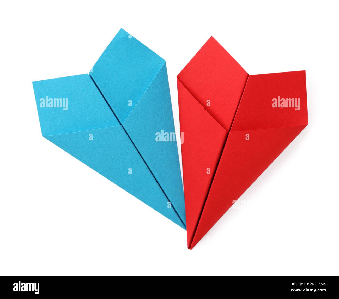 Handmade light blue and red paper planes isolated on white, top view ...