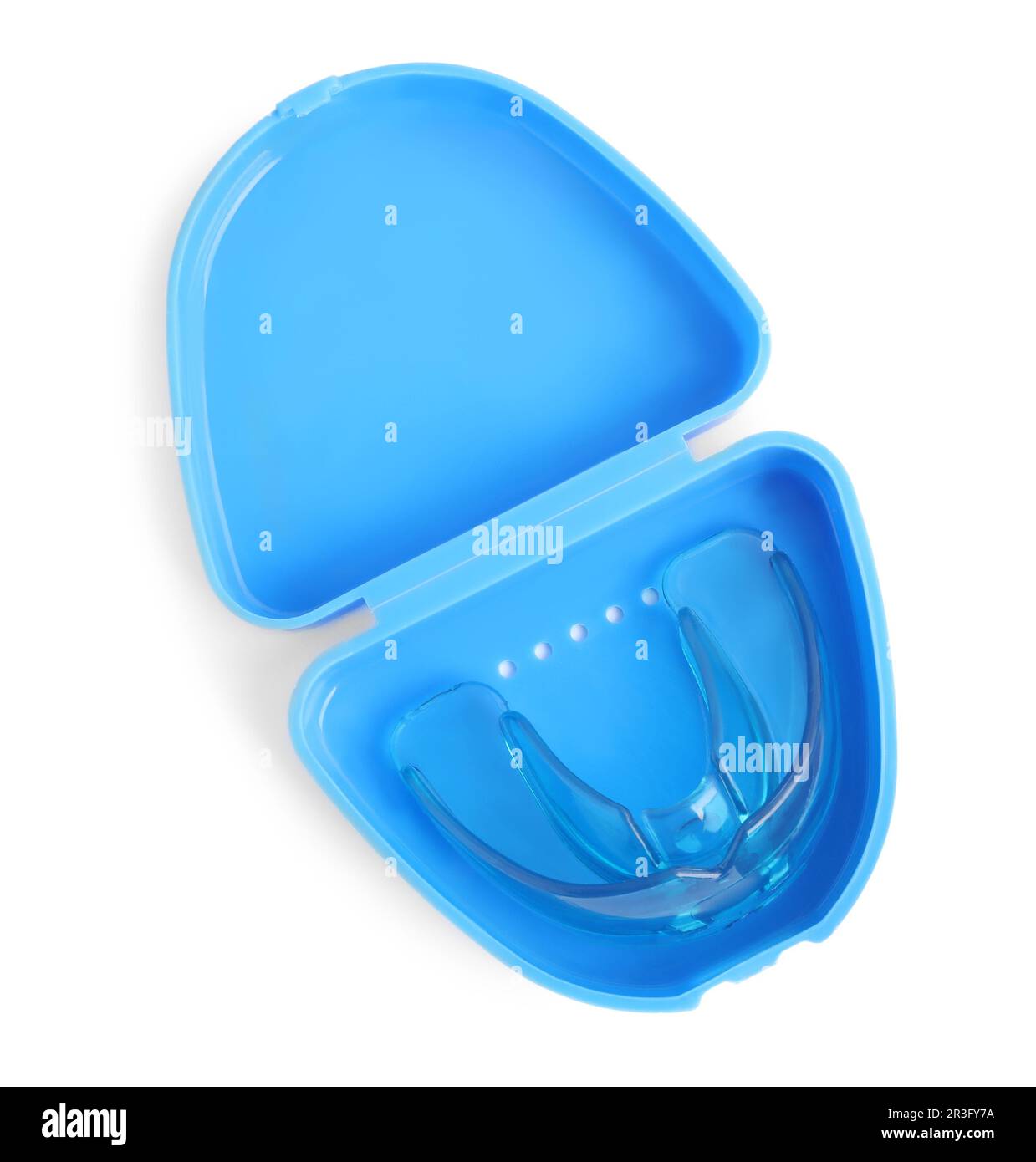 Transparent dental mouth guard in container isolated on white, top view ...