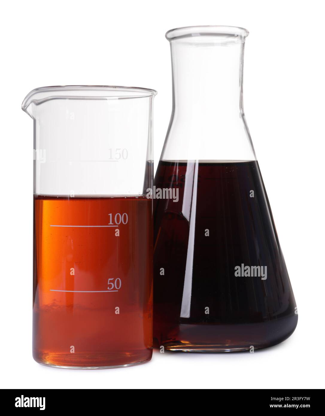 Laboratory glassware with brown liquids on white background Stock Photo ...