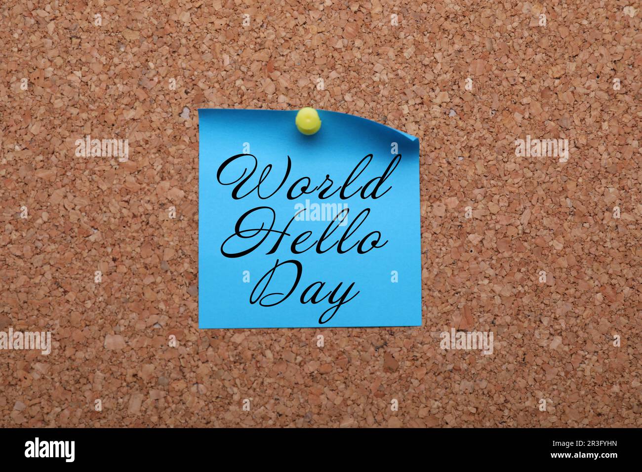 Paper note with phrase World Hello Day pinned to cork board Stock Photo ...