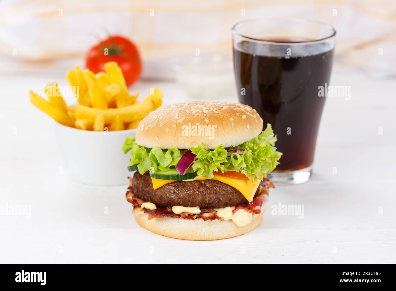 Hamburger cheeseburger fast food meal menu with fries and coke drink on ...