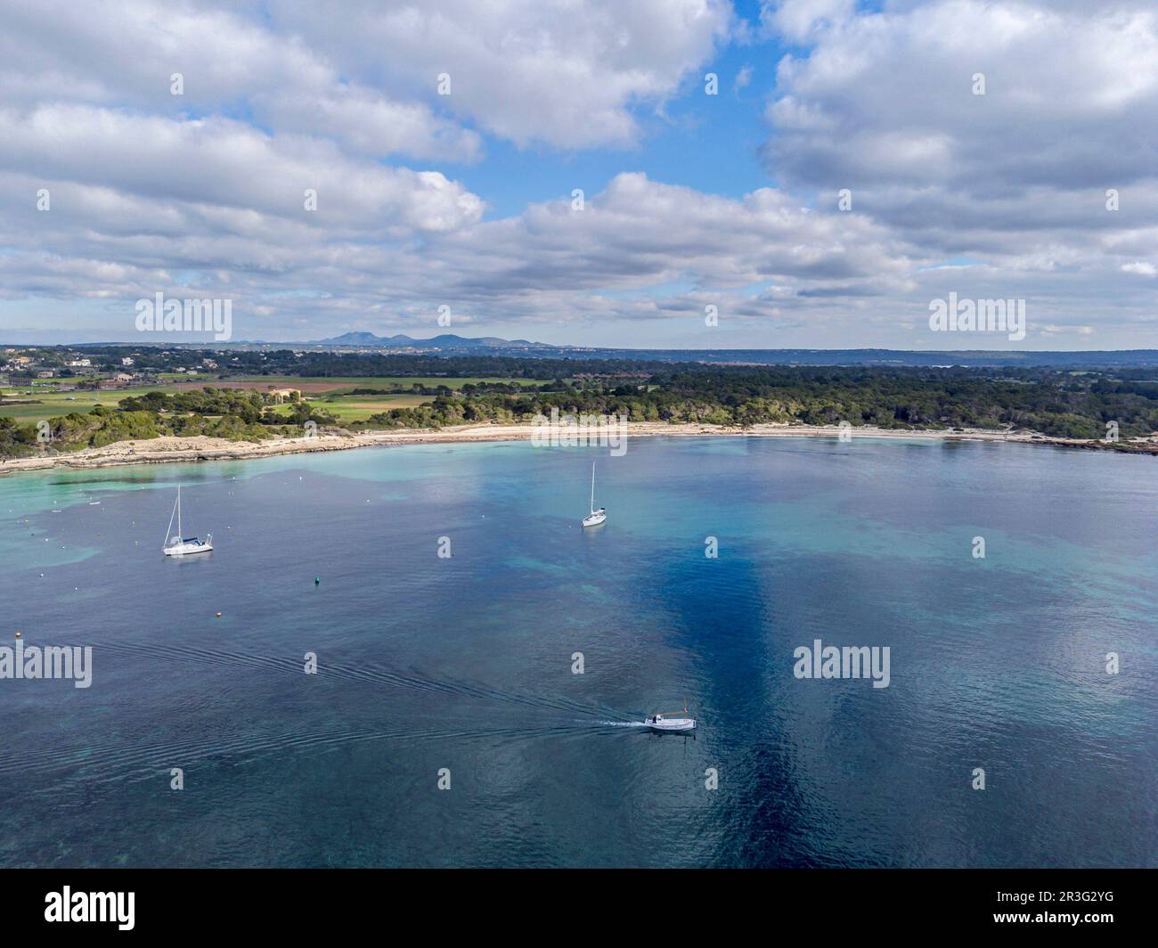 sailing yacht anchored in front Es Dolç beach, Colònia de Sant Jordi ...