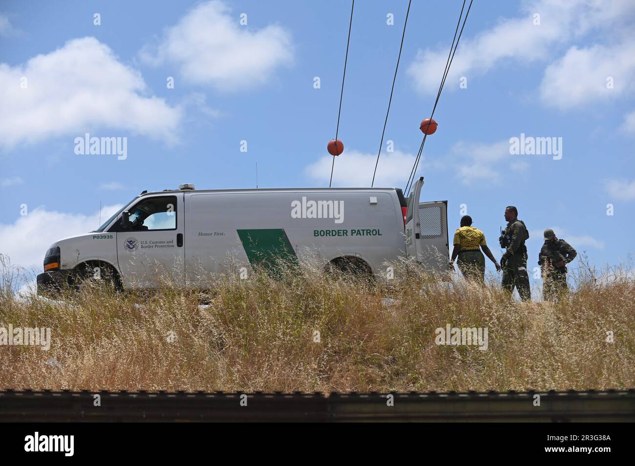 San Diego, USA. 09th May, 2023. Migrants are captured during a crossing ...