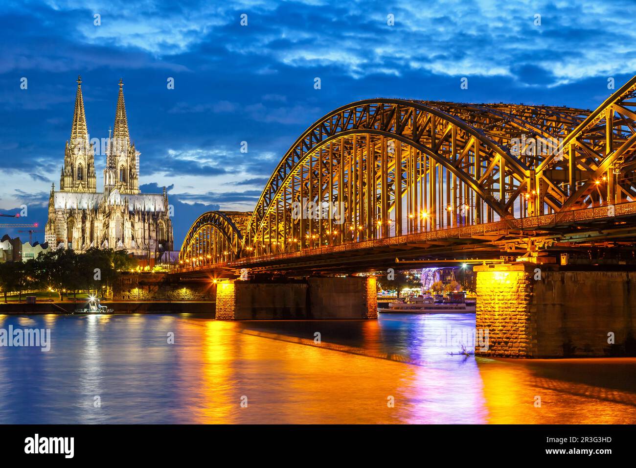 Cologne Cathedral skyline and Hohenzollern bridge with river Rhine in ...